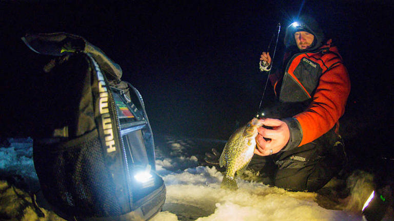 Ice fishing river backwaters for slab crappies