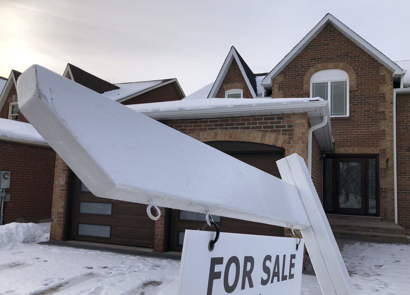 Greater Toronto home sales, prices slide in January with more weakness ...