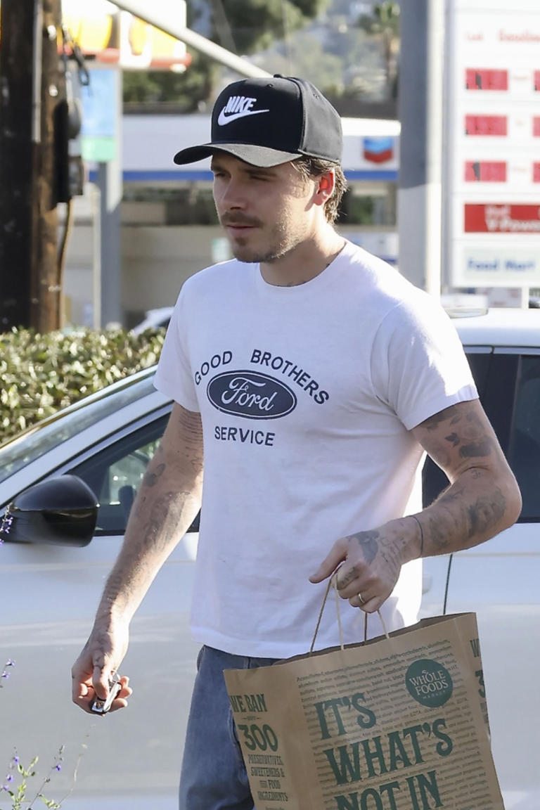 Brooklyn Beckham covers tattoo dedicated to dad David in latest blow to ...