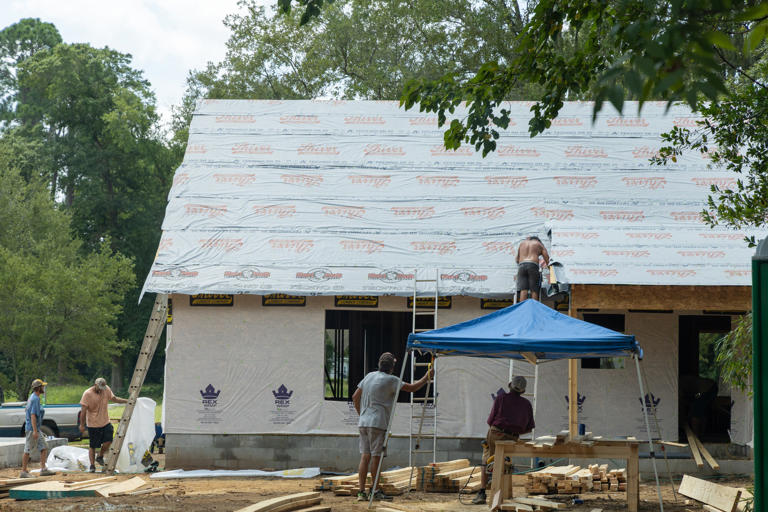Single mother truck driver, two children move into donated $200,000 home