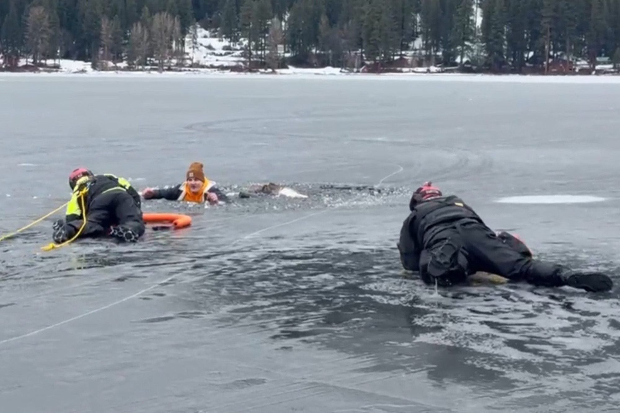 Washington man falls through ice into frigid lake — right in front of ...