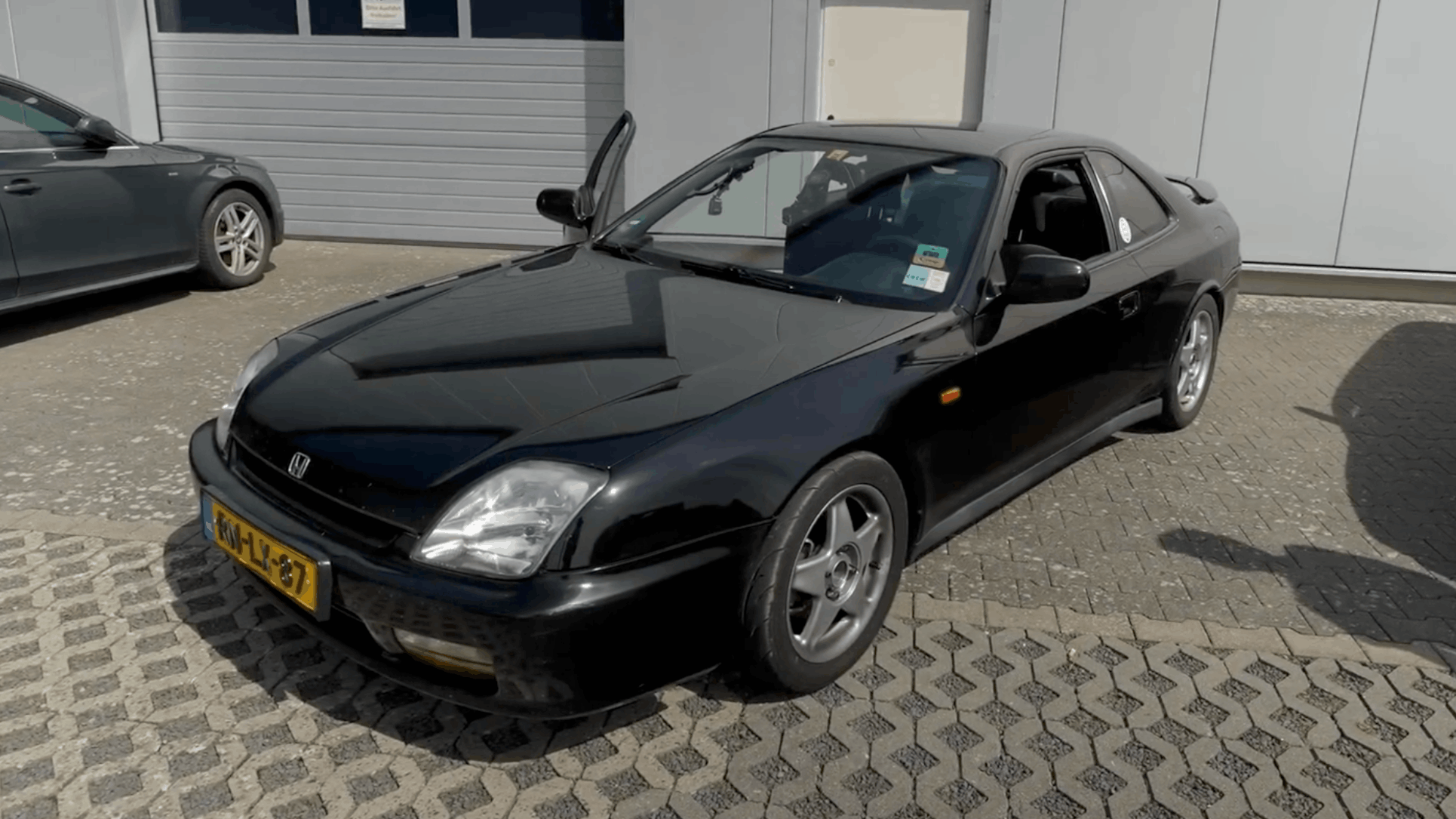 Comparing classic and modern sports cars in action