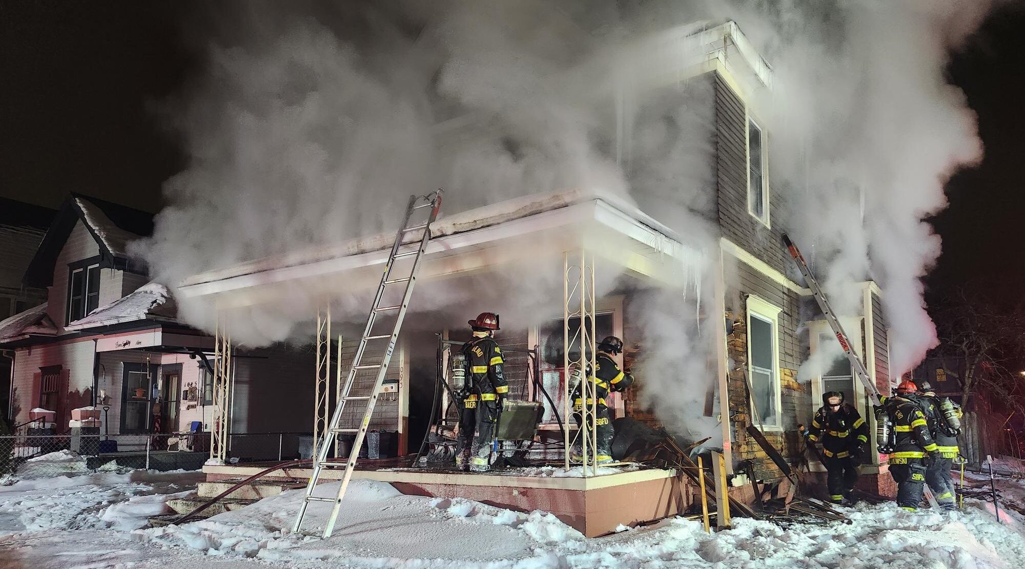 Two firefighters injured battling house fire in South Bend