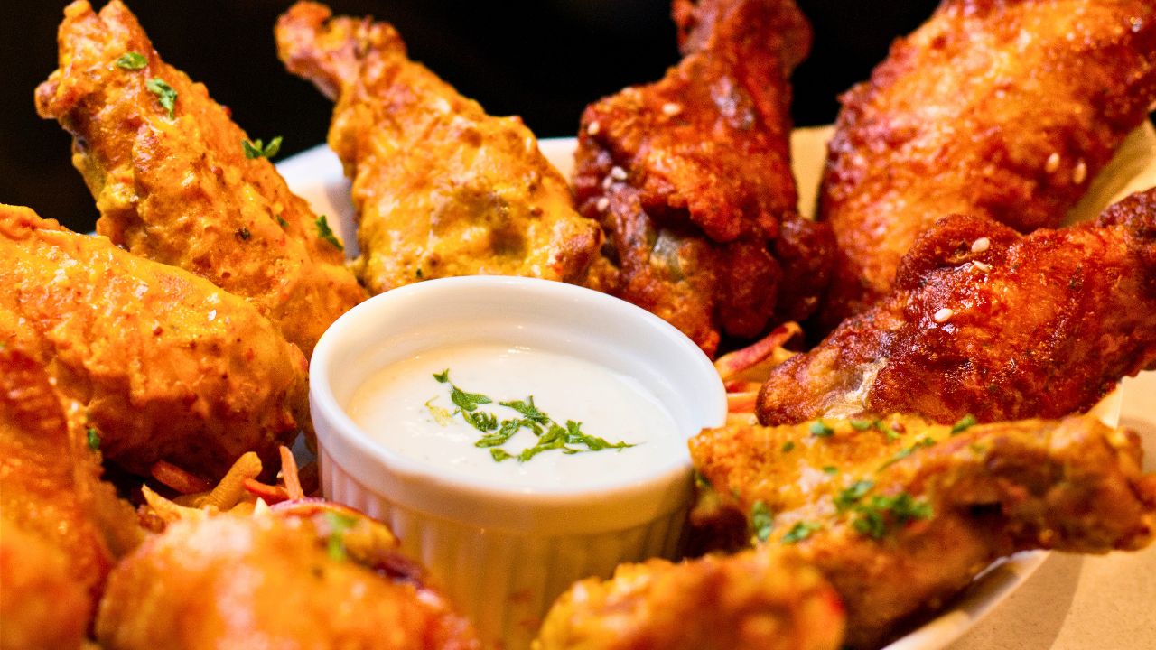 A stranger sat down and ate the chicken wings off my plate. The ...