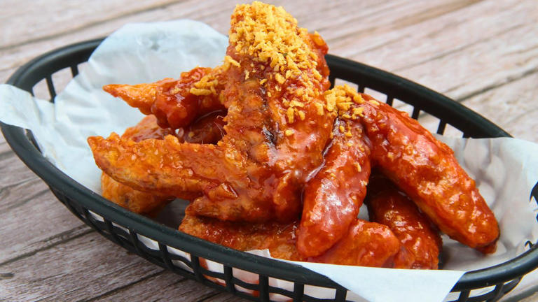 Total stranger walked up and devoured the chicken wings on my plate ...