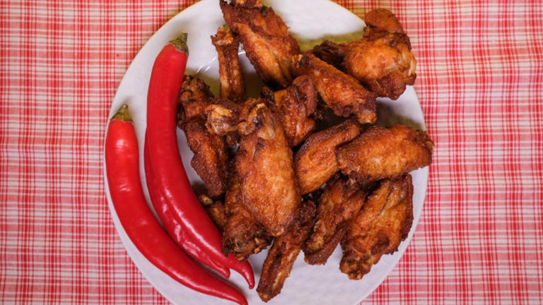 Total stranger walked up and devoured the chicken wings on my plate ...