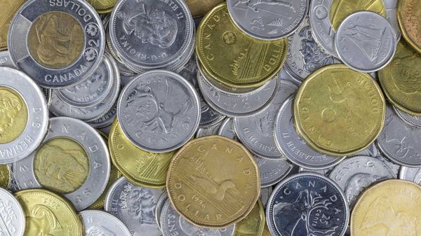 A new Canadian coin is like a fancy quarter and it's worth more than 25 ...