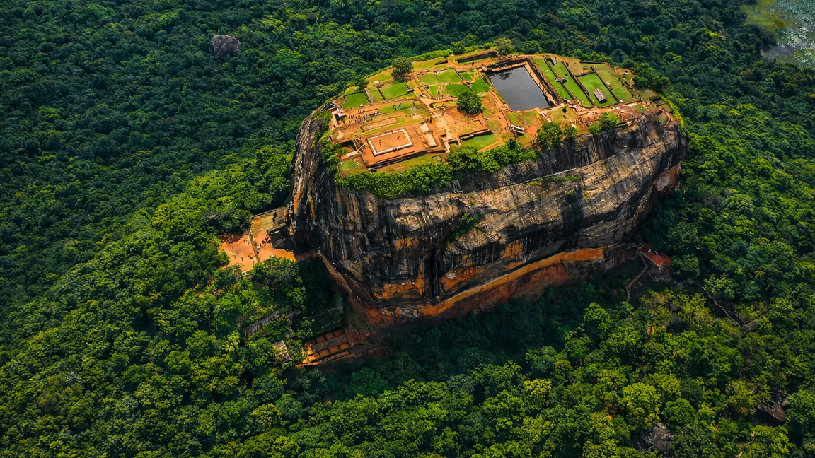 Ancient fortress rising above the jungle canopy