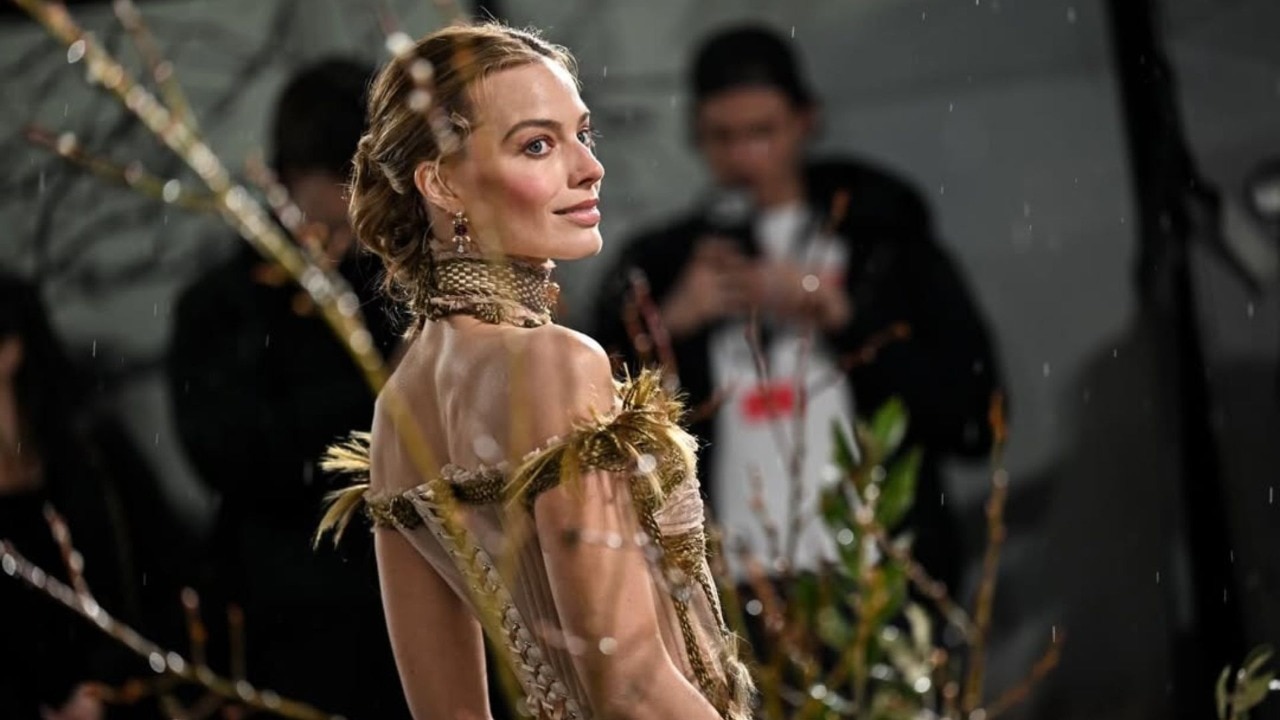 Margot Robbie honours Emily Bronte with mourning bracelet at London ...