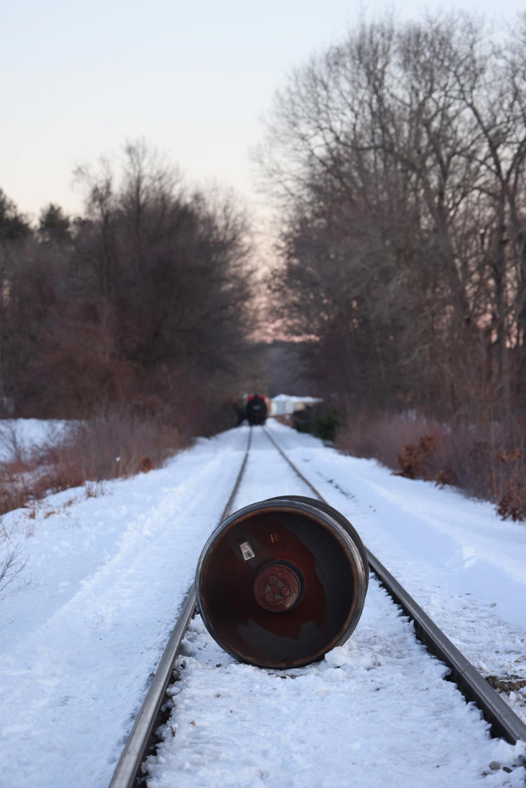 Rail cars removed from river and up righted after train derailment in ...