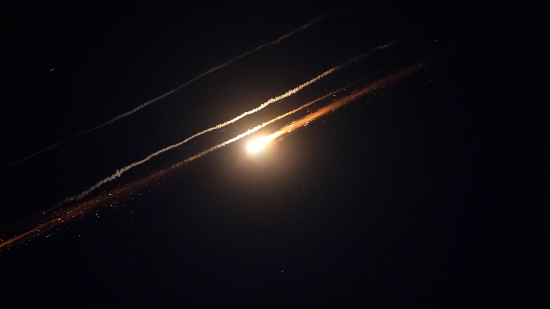 Iranian missile barrage lights up the sky over Israel