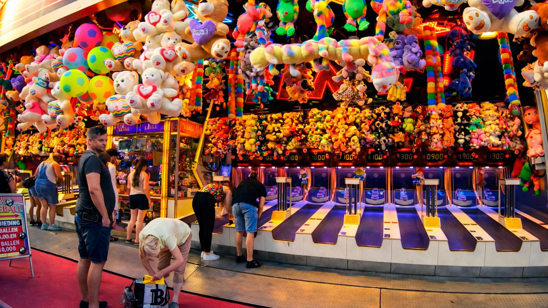 Colorful game booths at a city carnival