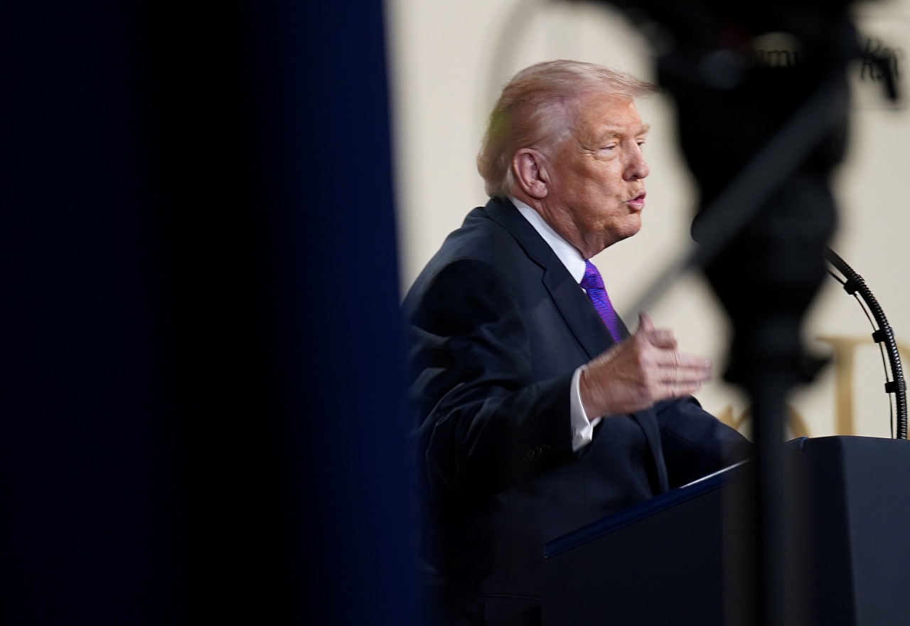 Trump posts, then deletes video depicting Obamas as apes