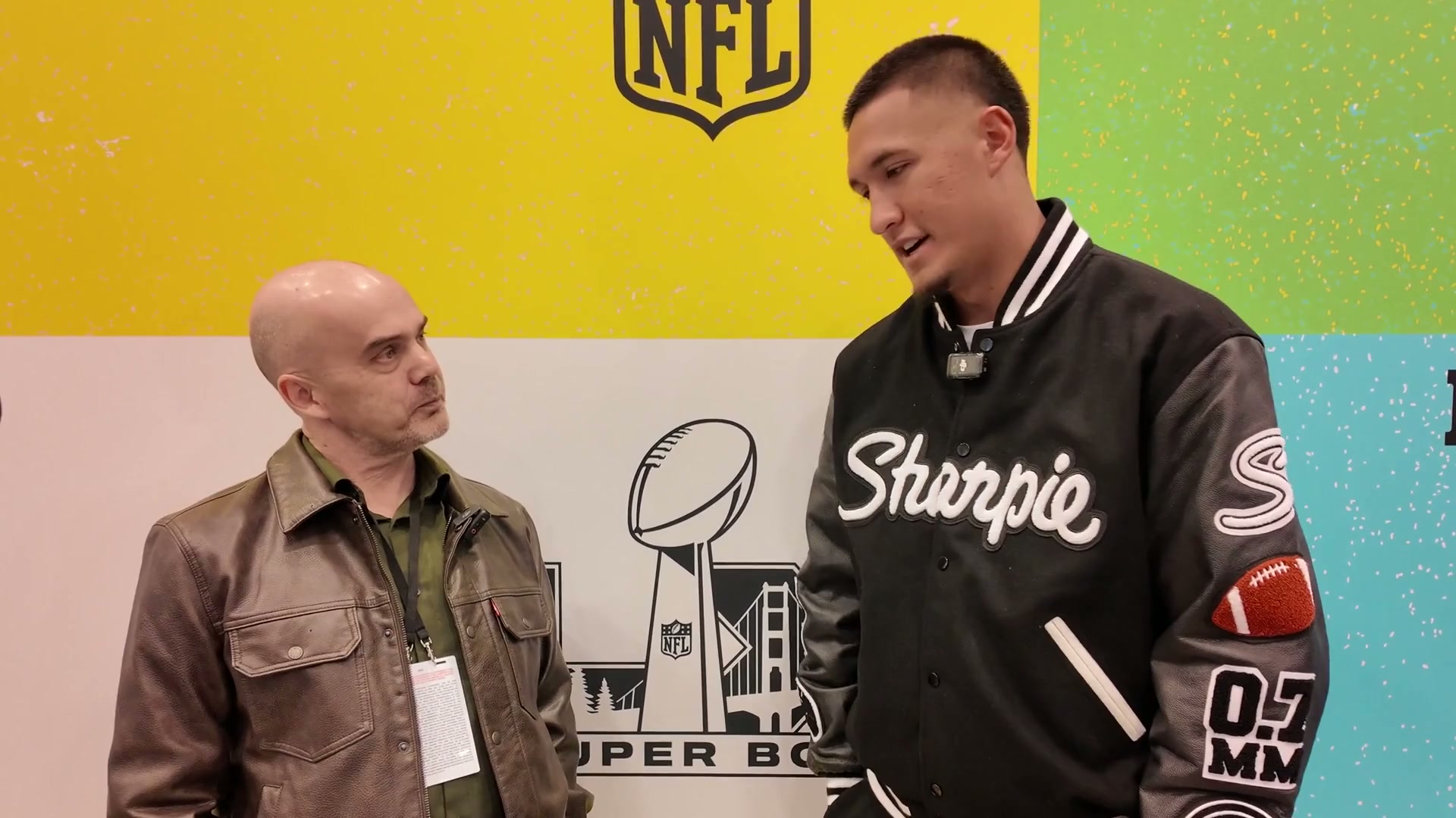 Tetairoa McMillan watches tape with Athlon Sports' Doug Farrar