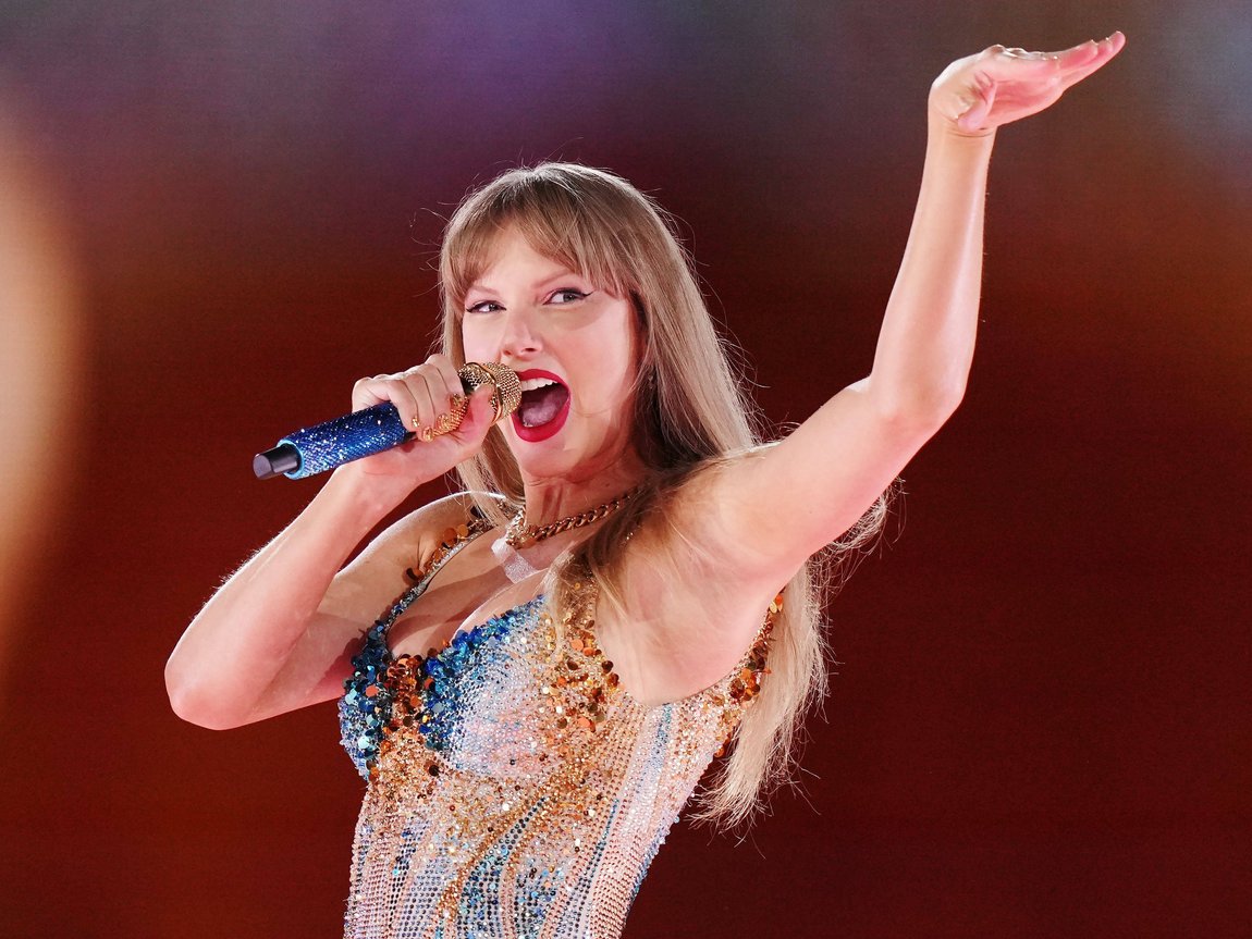 Taylor Swift surprises with star-studded cast in "Opalite" music video