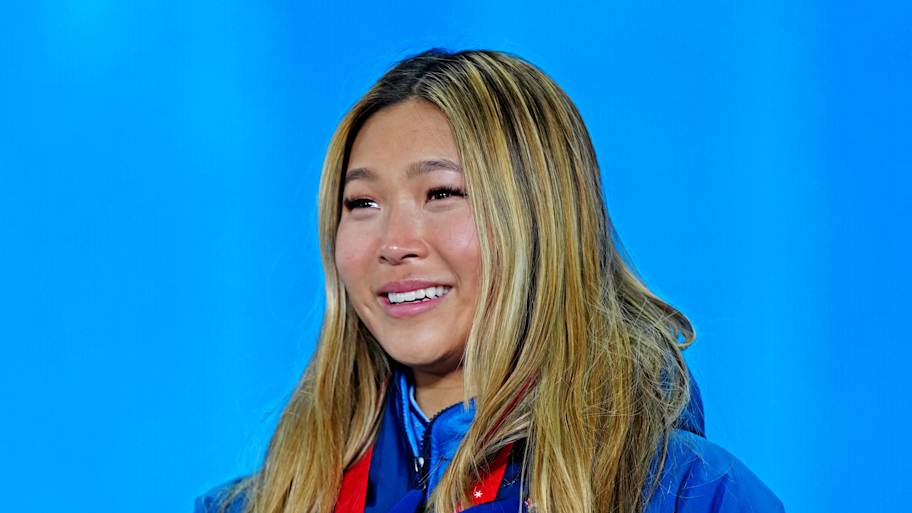 Gold medalist Chloe Kim turns heads in Team USA fit for Olympics ...