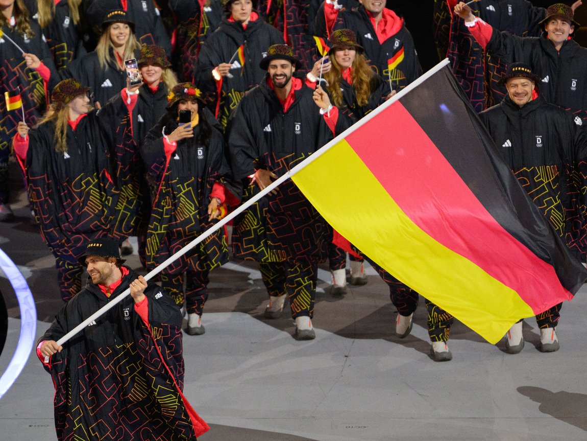 German flag bearer: Leon Draisaitl beams at Olympic ceremony