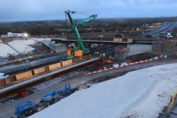 Watch - Timelapse shows new bridge support installed during full M3 closure