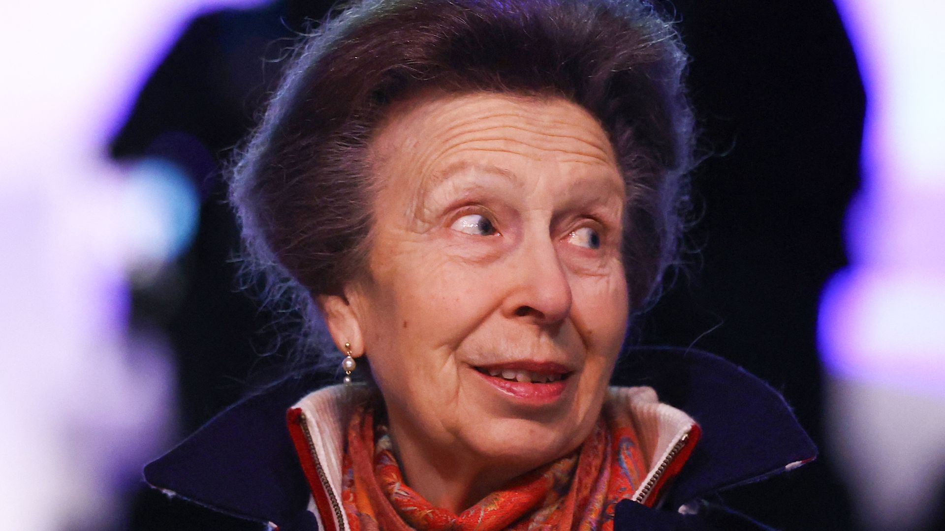 Princess Anne and husband Sir Timothy Laurence beam in matching scarves ...