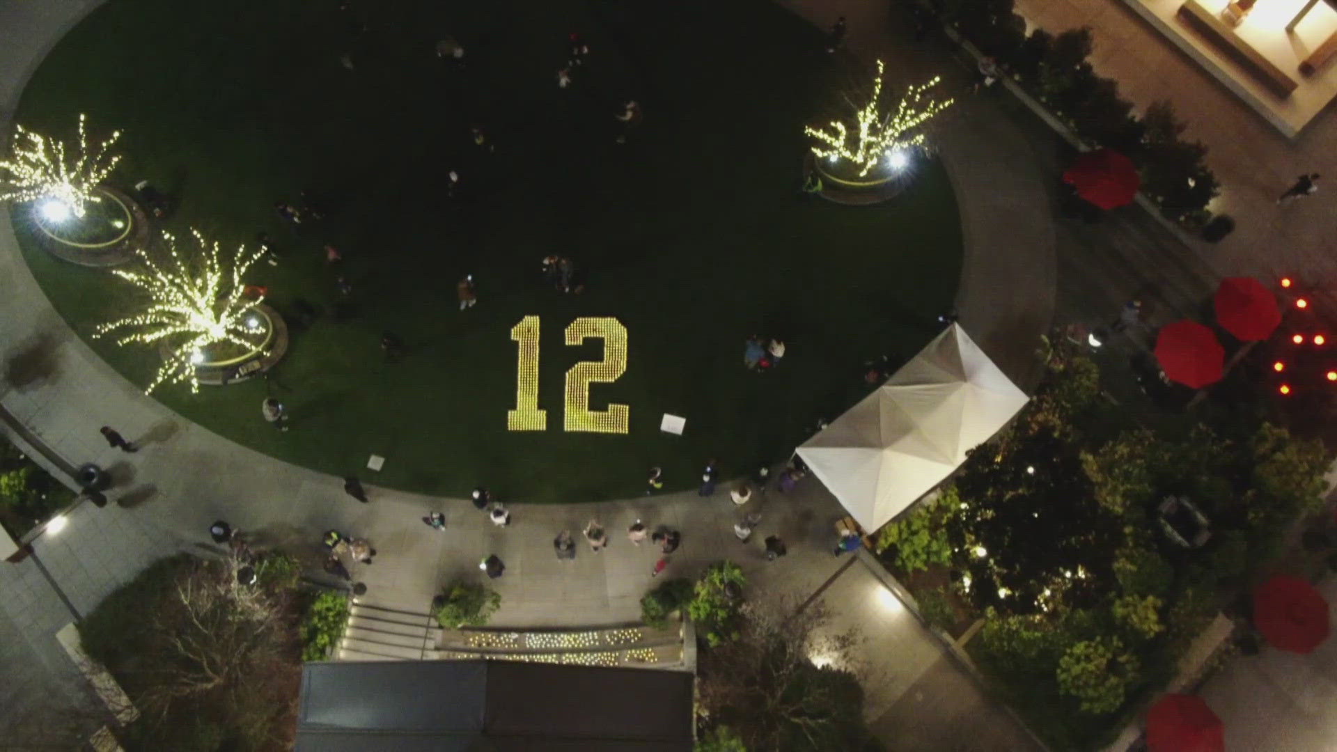 Glowing glass '12' lights up Seattle