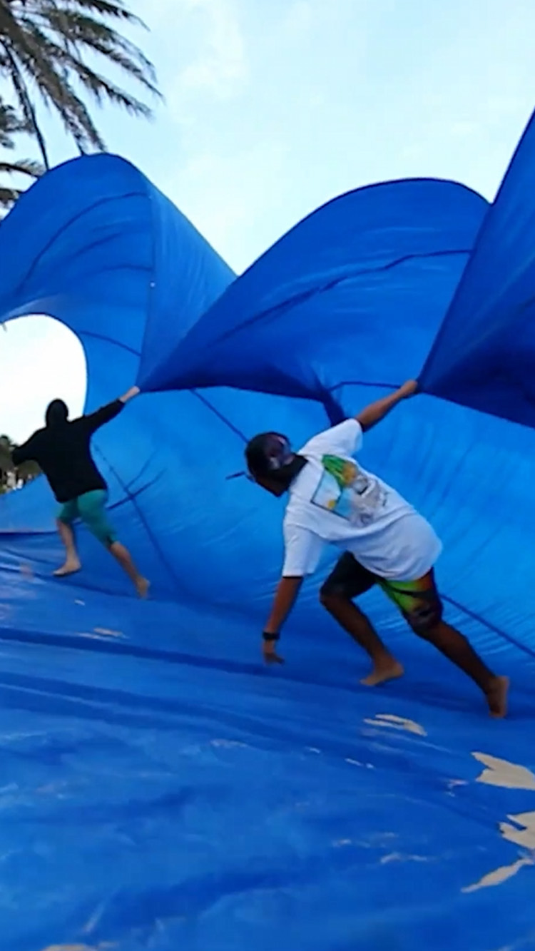 This giant tarp turns into a surf wave