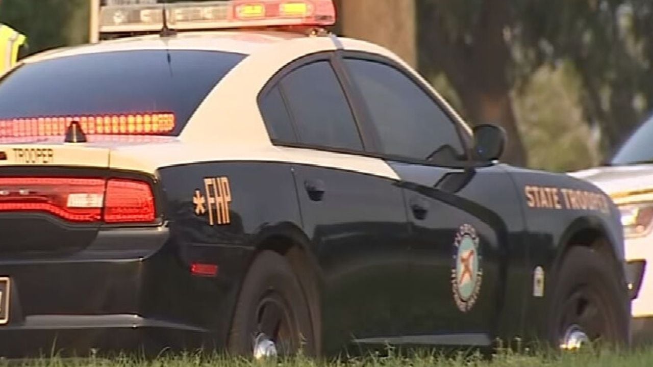Two Florida Highway Patrol troopers surrender themselves to Osceola ...