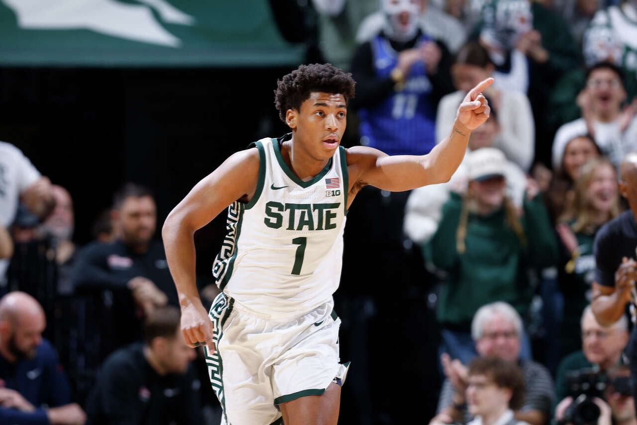 Michigan State's Jeremy Fears trips Illinois basketball forward David ...