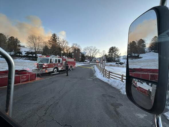 Fire crews continue to contain fire at Bridgewater woodworking shop