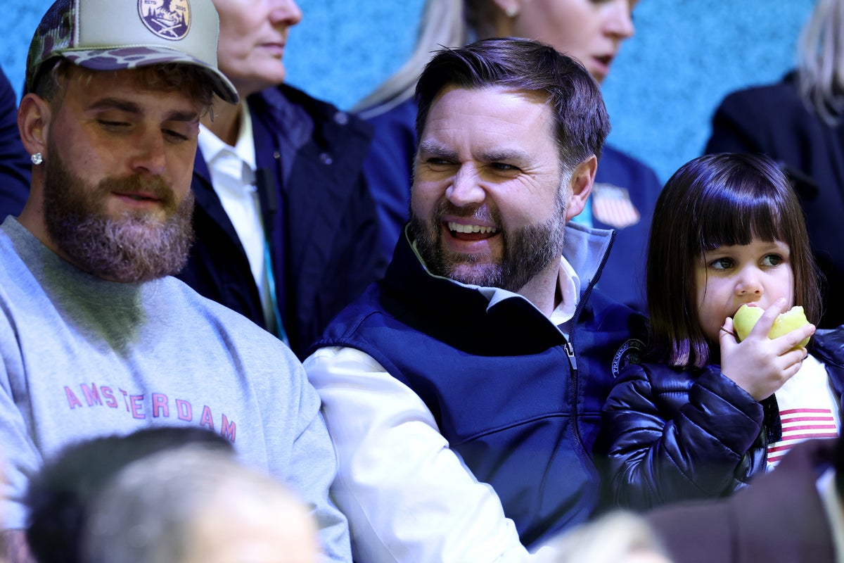 JD Vance and Jake Paul sit together at Winter Olympics
