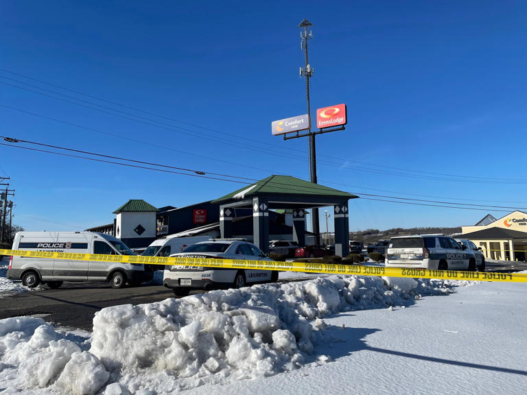 Man with outstanding warrant surrenders after hour-long standoff at ...