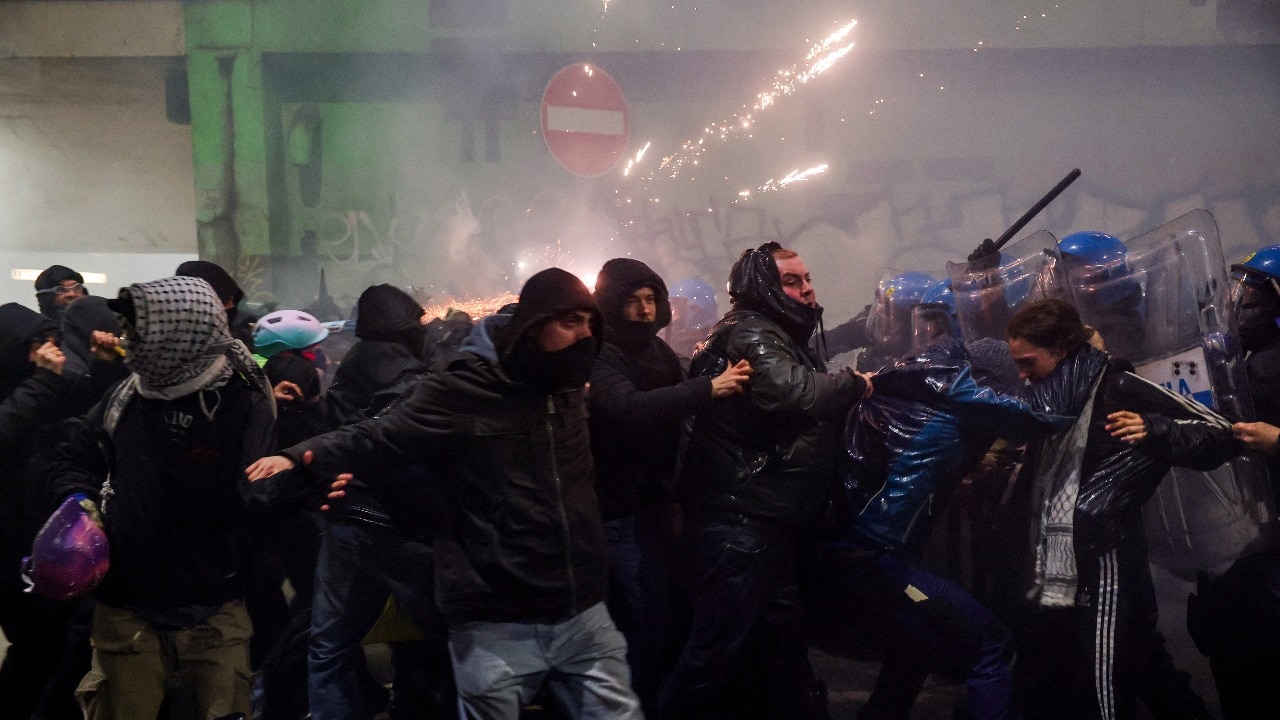 Italy police fire tear gas, water cannon to break Winter Olympics protest