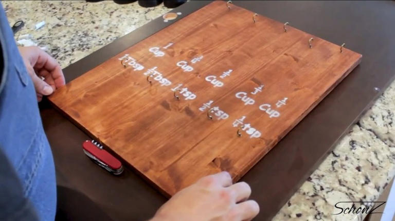 Free up drawer and cabinet space with this smart measuring cups storage ...