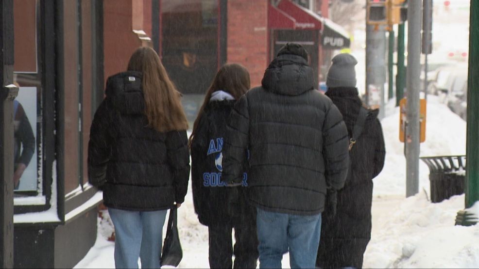'The snow can't wreck the night': Neighbors brave extreme cold to ...