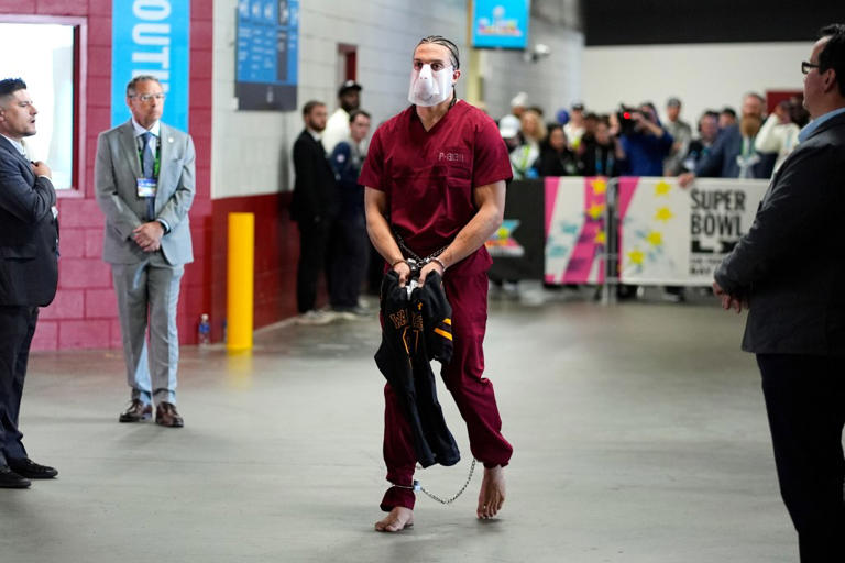 Patriots’ Mack Hollins arrives at Super Bowl 2026 in prison jumpsuit ...