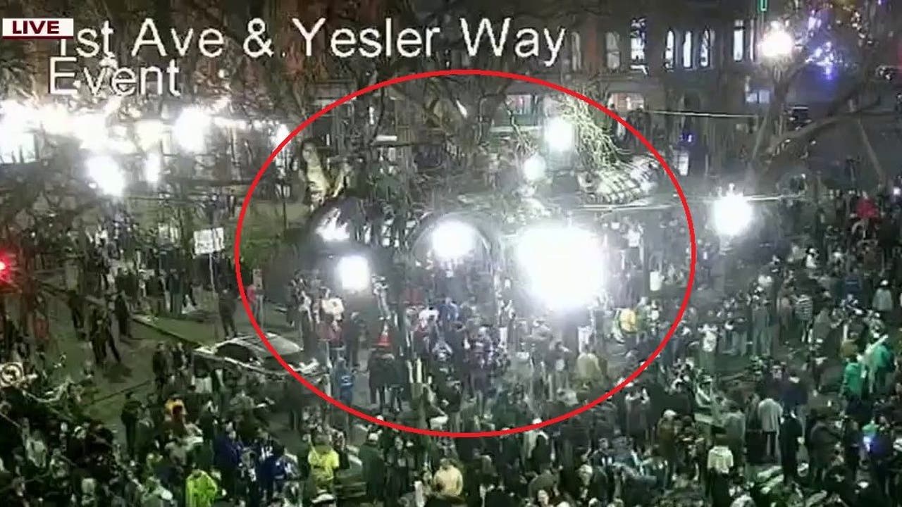 Fans seen climbing pergola in Seattle's Pioneer Square after Seahawks ...