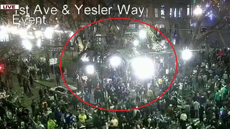 Fans seen climbing pergola in Seattle's Pioneer Square after Seahawks ...