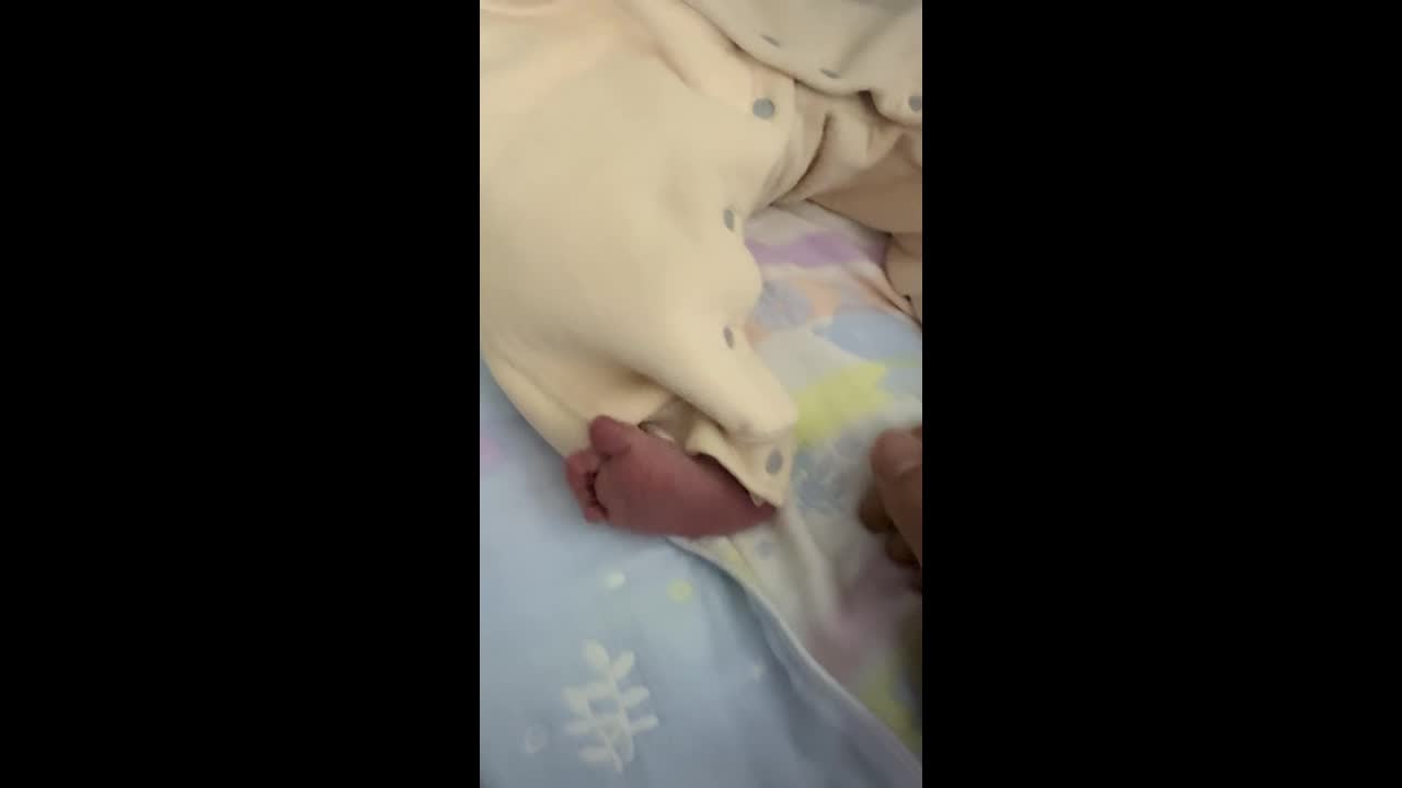 Adorable baby reacts to foot tickles in Guangdong, China