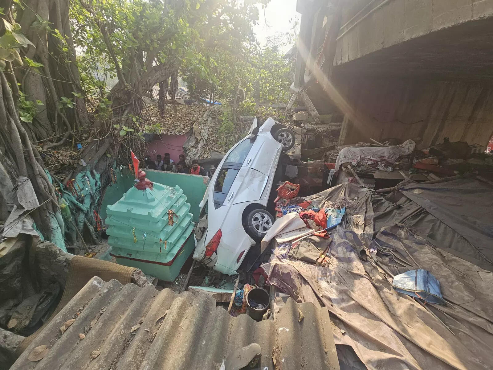 Car fleeing murder scene plunges 20ft from overbridge