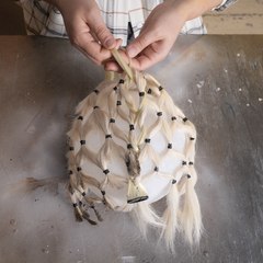 Recycle your hair into a stylish net bag and brush off any judgement! 👜