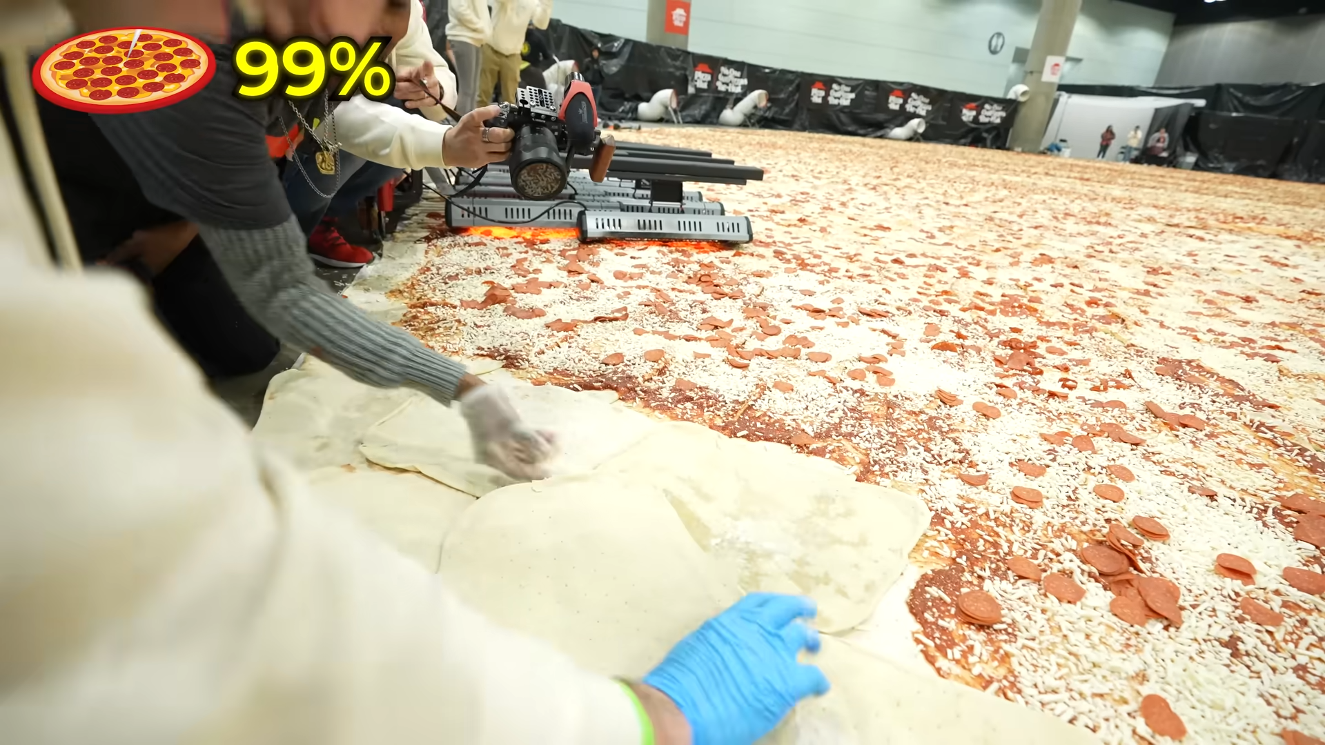 This pizza was 132.5 feet long - and took 68,000 slices