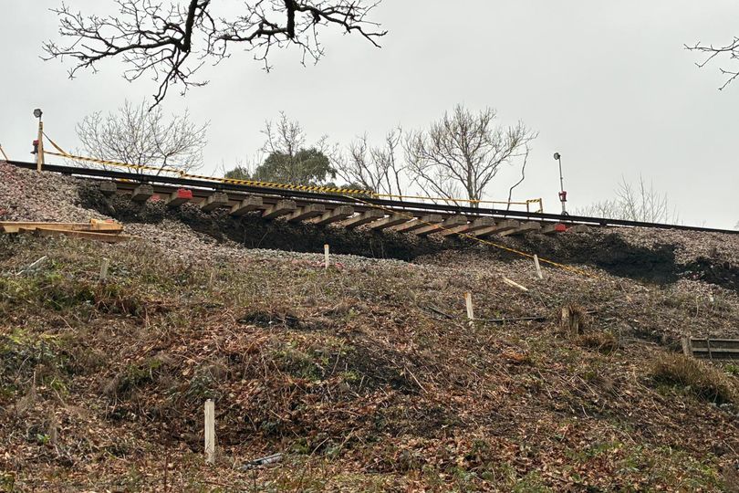Landslip that's left Surrey rail tracks hanging in mid-air to close ...