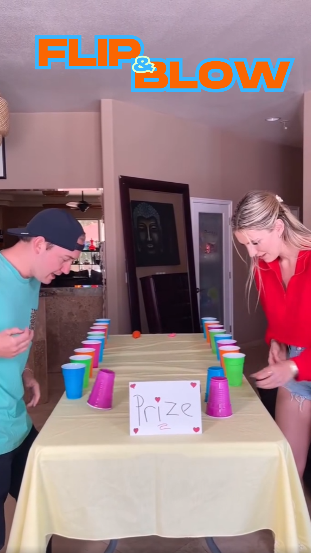 Husband and wife face off in a flip cup challenge