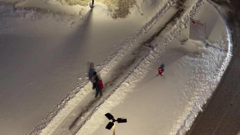 Kids walk to school with wind chills -15 below zero