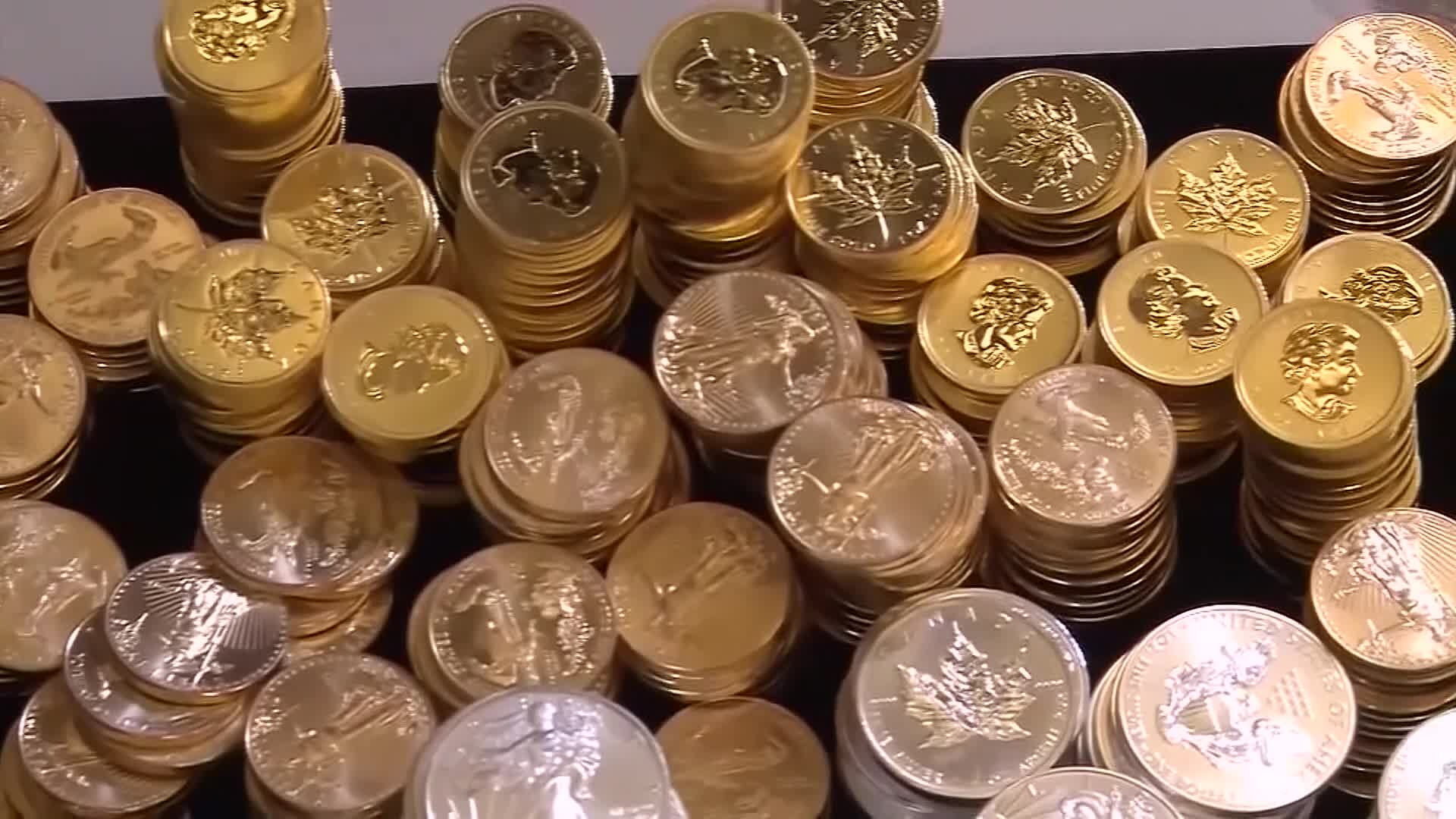 Gold prices hit record high above $5,000 per ounce