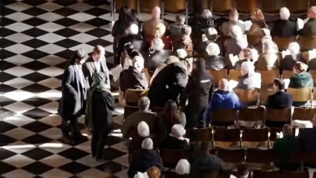 Heckler objects to swearing in of first female Archbishop of Canterbury