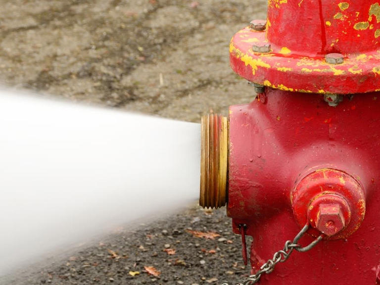 Vehicle crashes into fire hydrant