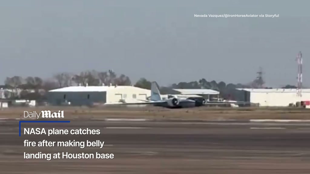 NASA plane catches fire after making belly landing in Houston