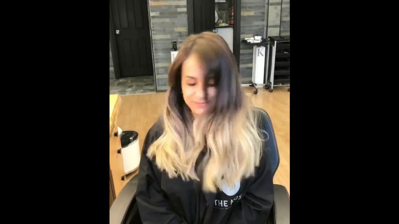 Seamless black and blonde hair transformation