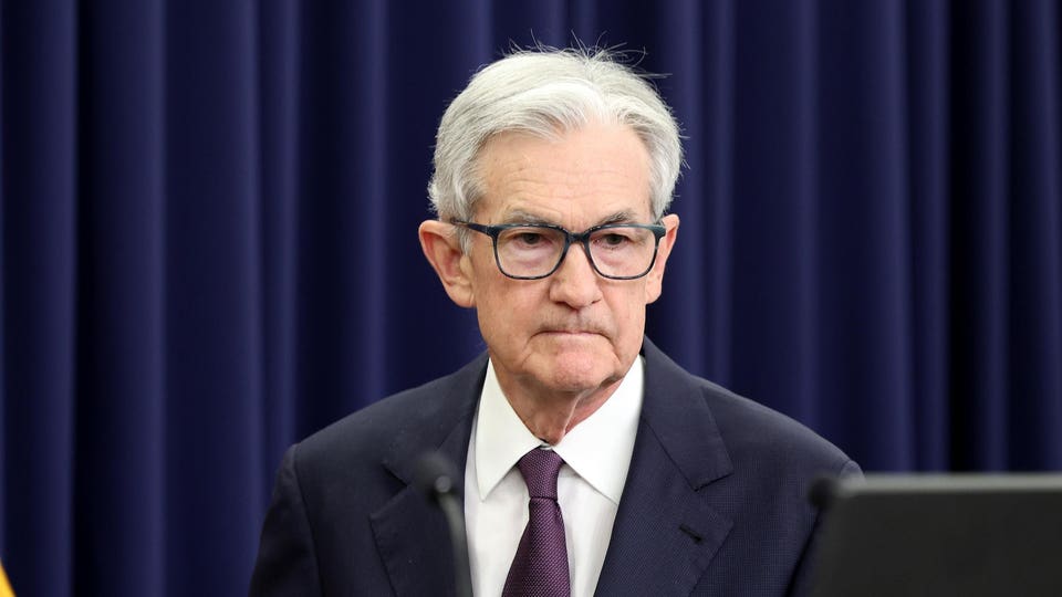 Fed holds interest rates steady as Trump pressures central bank