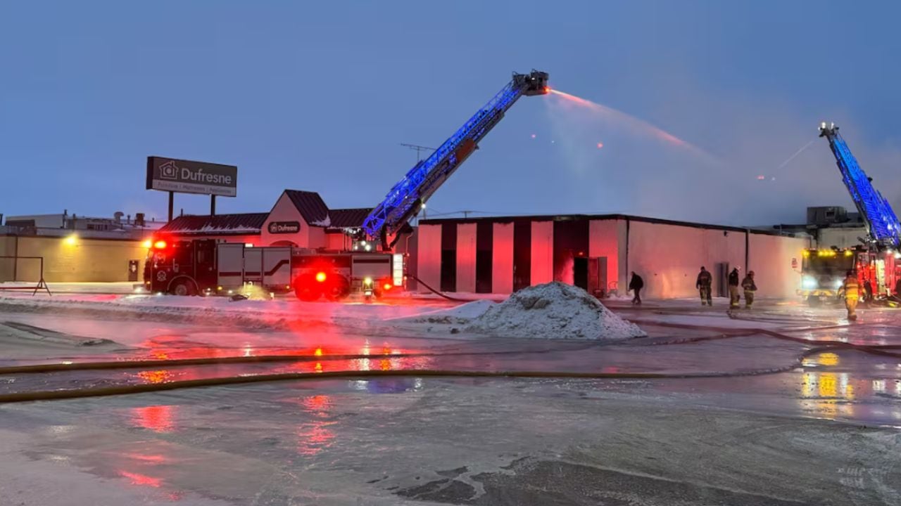 Fire crews work to contain blaze at commercial building on Nairn Avenue